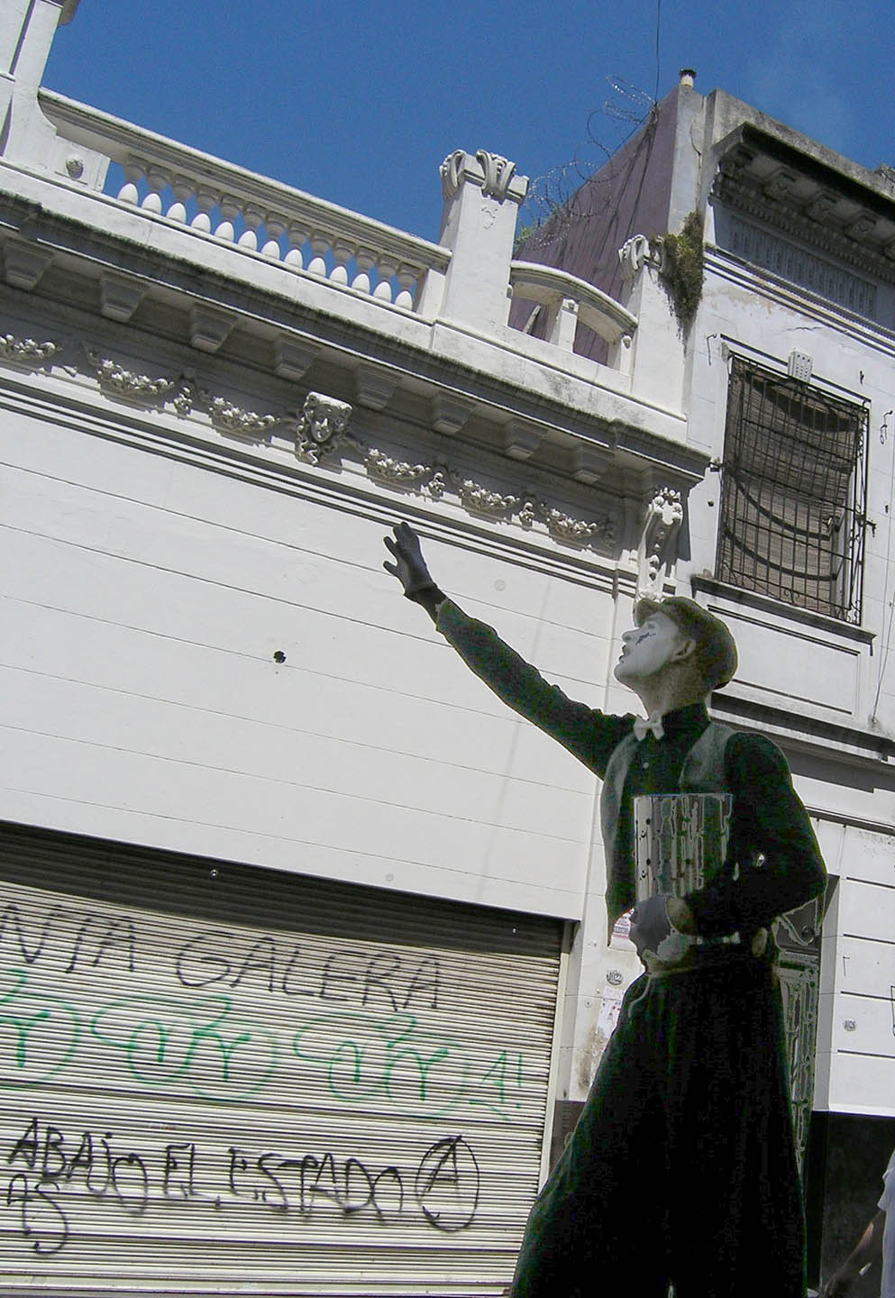 ba-san-telmo-mime-stilts-sm – Ruth Rosenfeld